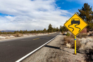 The Slippery When Wet Road Sign: What It Means & Why Matters - Traffic ...