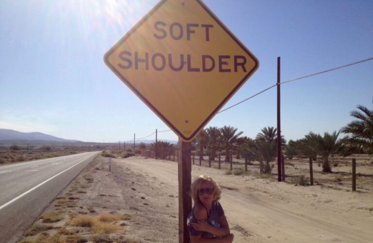 What does soft shoulder sign mean? - Traffic Signs Test